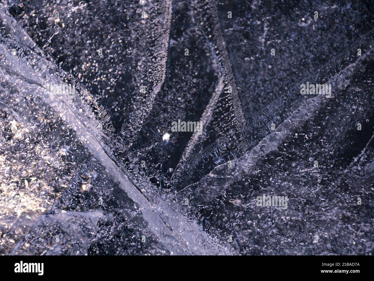 Ice texture. Sun rays on ice. Silver ice texture. Background photo ...