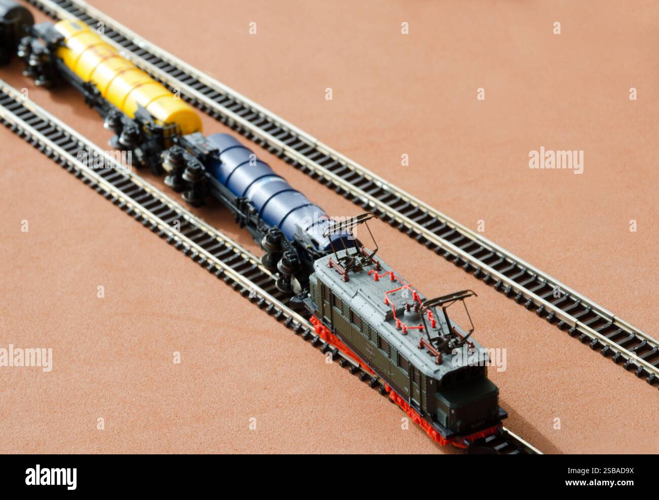 Crash of fuel tanks. Toy railroad with selective focus effect. Model of ...