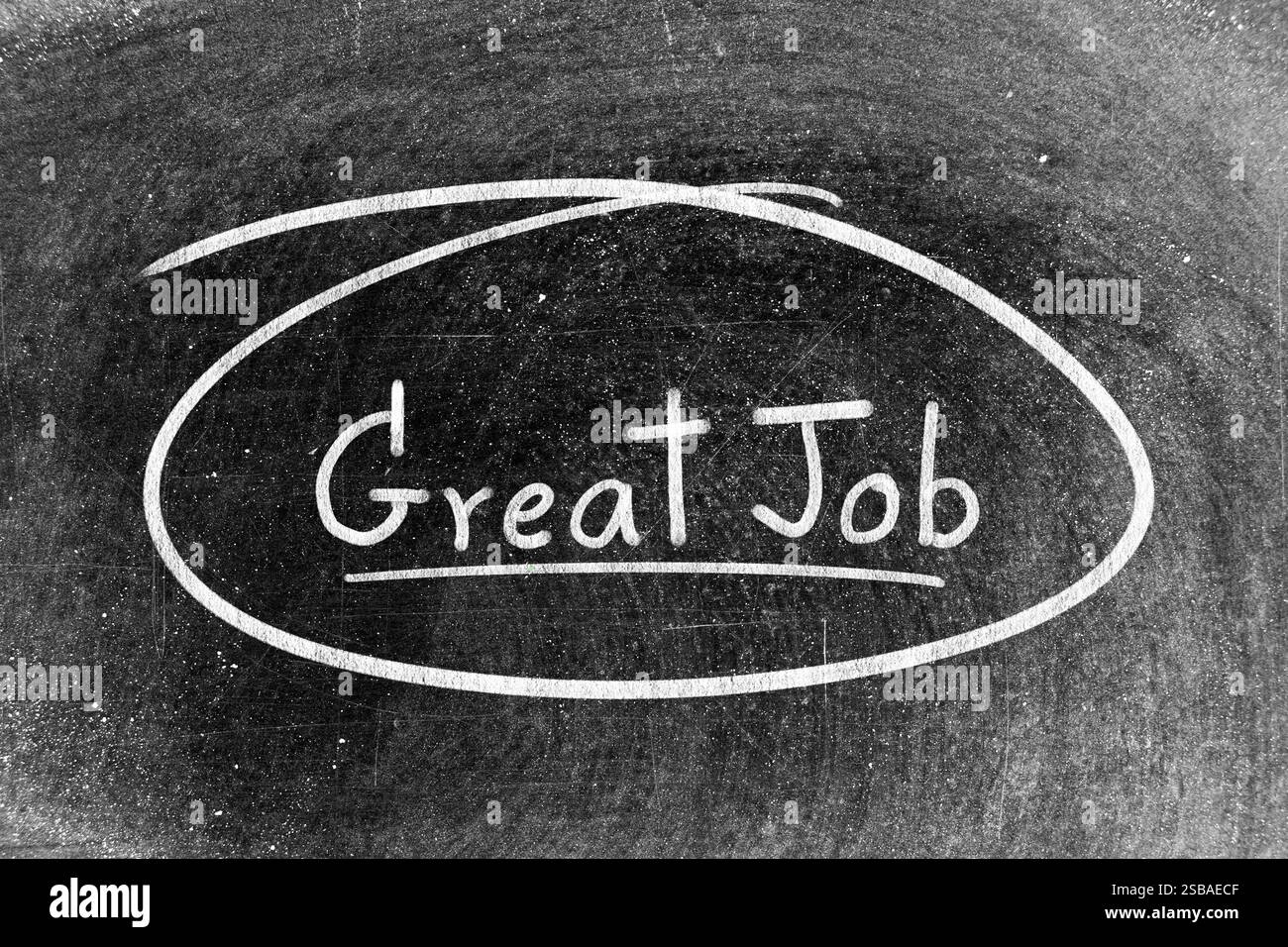 White chalk hand writing in word great job and circle shape on ...