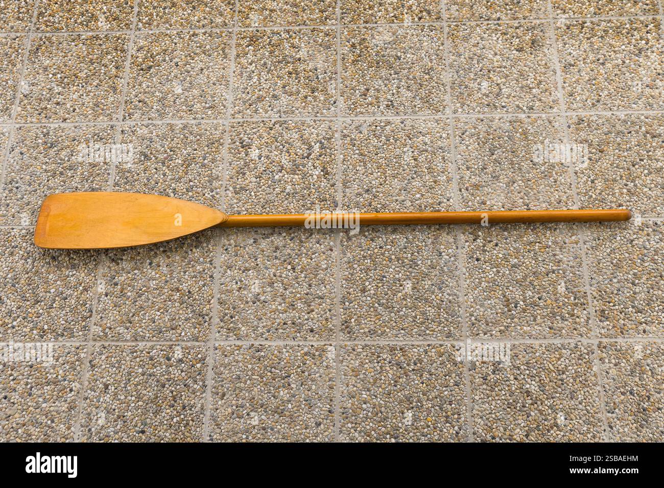 Old wooden paddle on the ground from sixties Stock Photo - Alamy