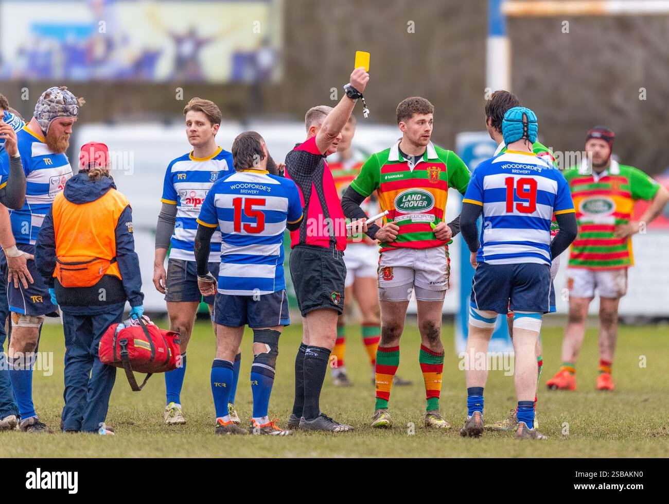Yellow card being shown to a player by the referee in a English mens ...