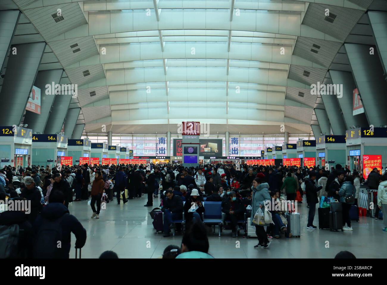 BEIJING, CHINA - FEBRUARY 2, 2025 - Passengers prepare to take a train ...
