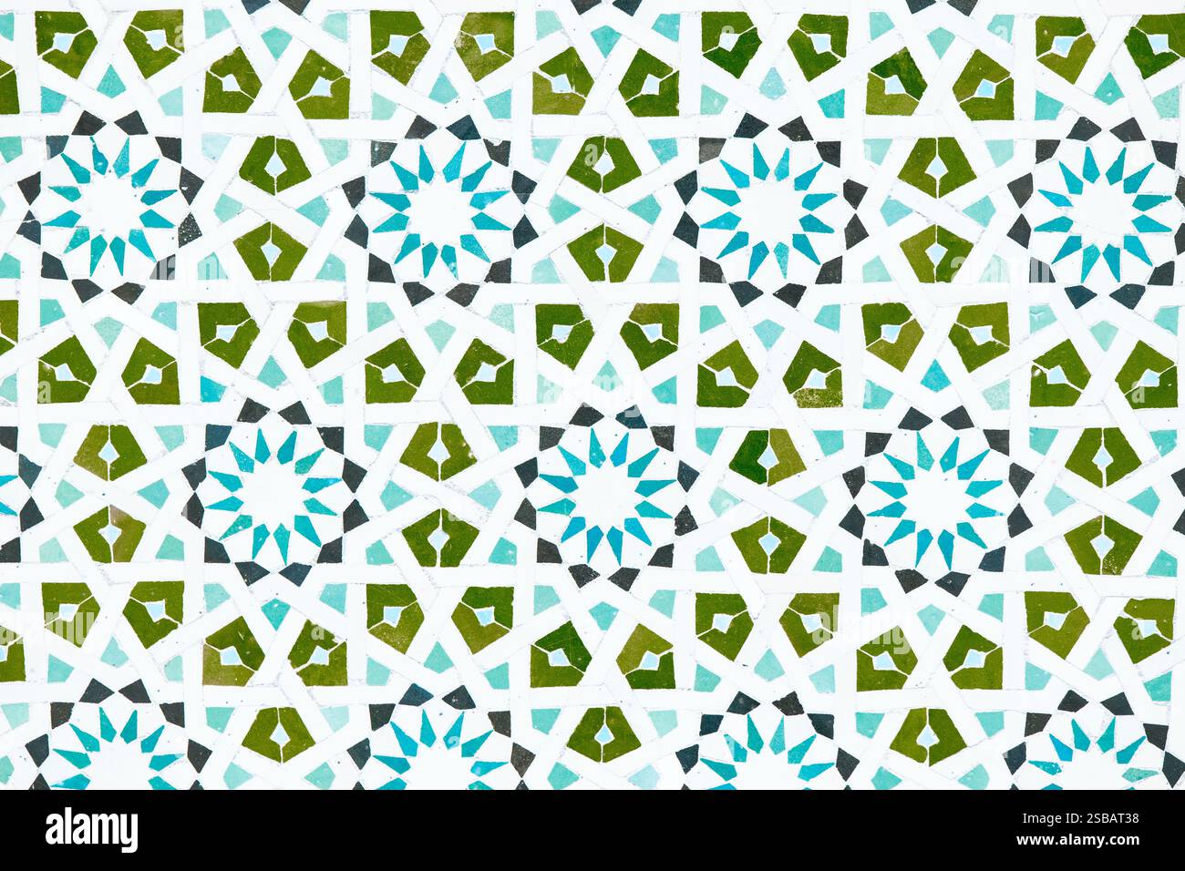 A detailed Islamic geometric mosaic featuring vibrant colors and ...
