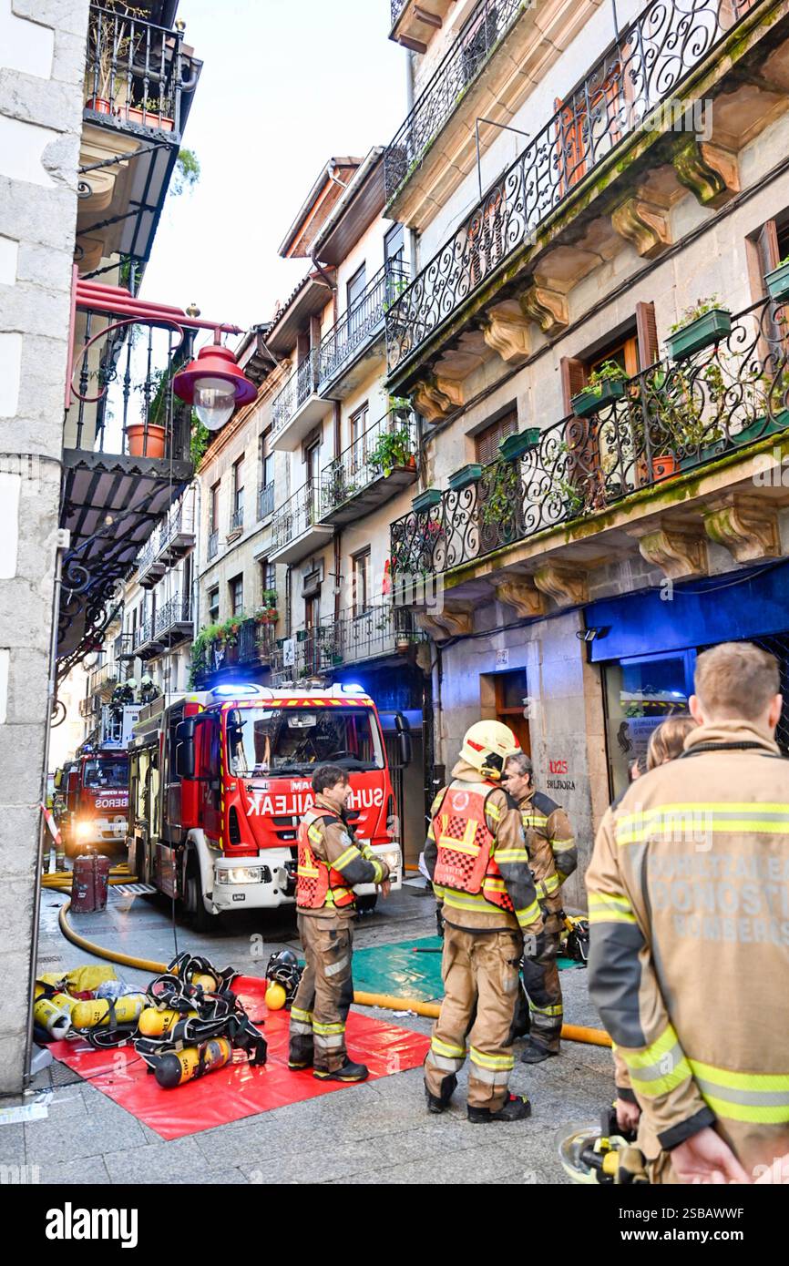 Firefighters work to extinguish the fire, February 2, 2025, in Hernani ...
