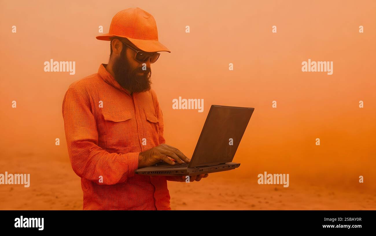 Rugged Technician Operating Weatherproof Laptop While Navigating ...