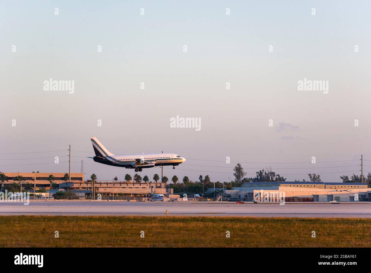 A private Boeing 737 jet lands at Miami International Airport in the ...