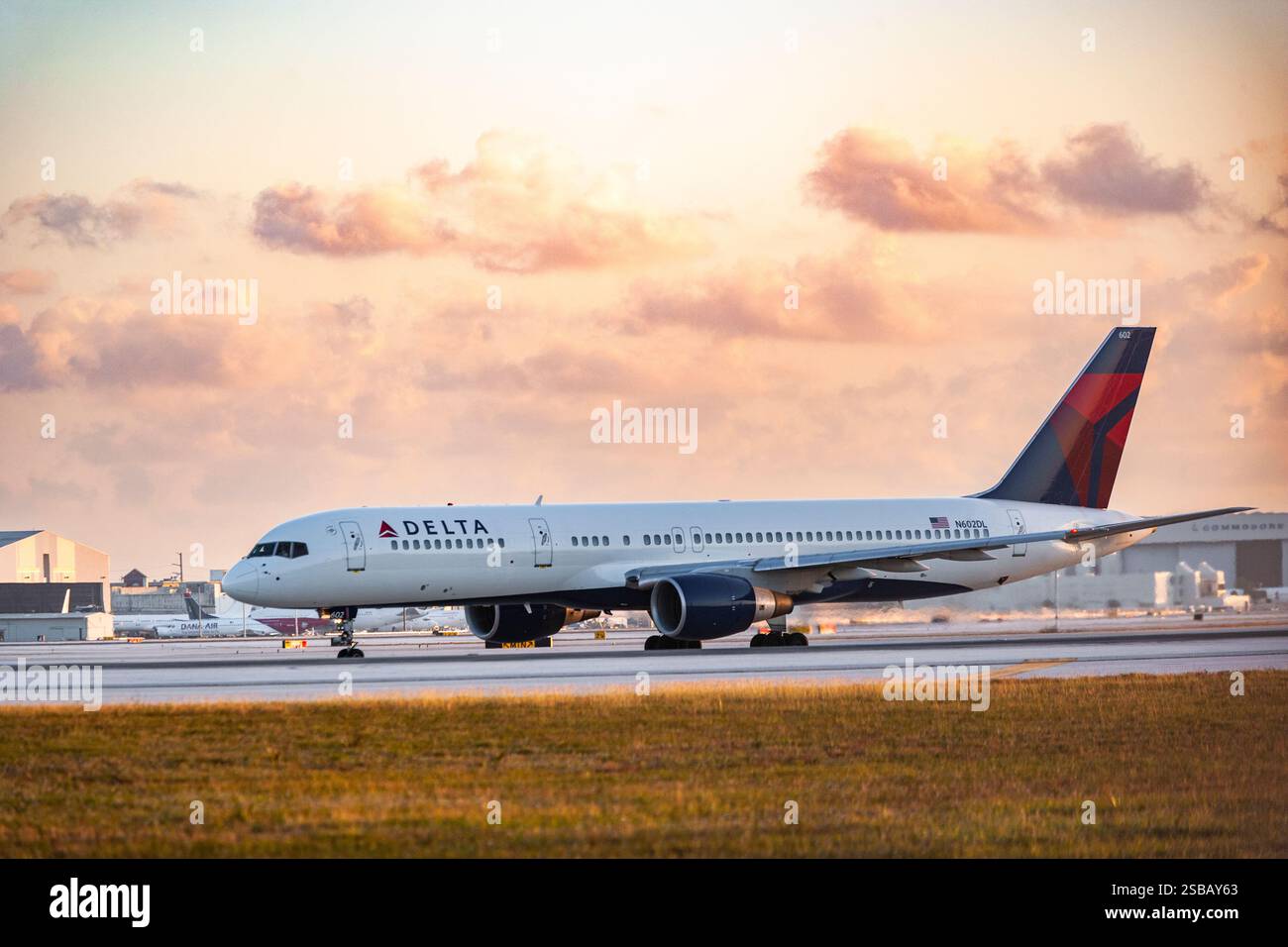 A Delta Air Lines Boeing 757 taxis at Miami International Airport ...