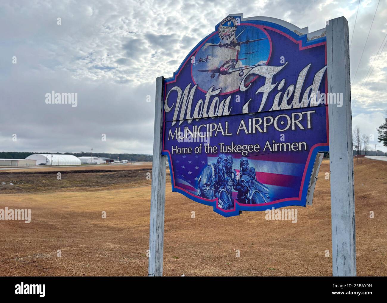 An airport sign paying tribute to the Tuskegee Airmen who once trained ...