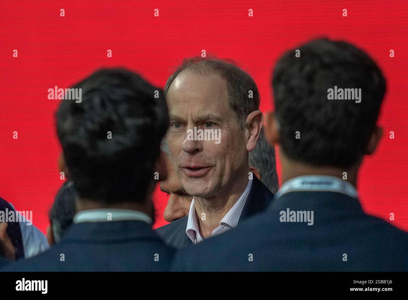 Britain's Prince Edward, the Duke of Edinburgh, speaks with students ...