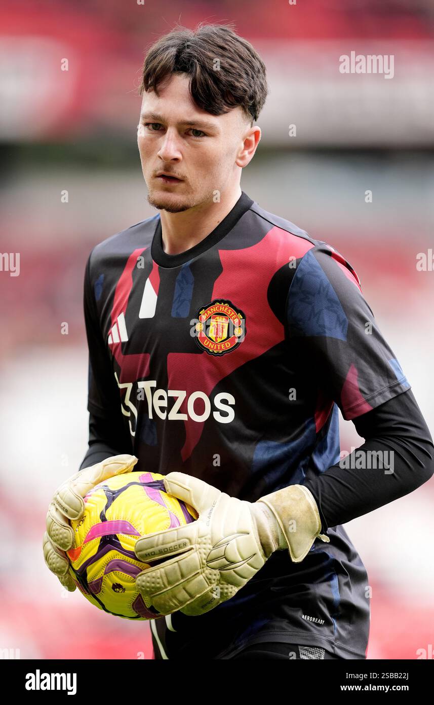 Manchester United goalkeeper Elyh Harrison warms up ahead of the ...