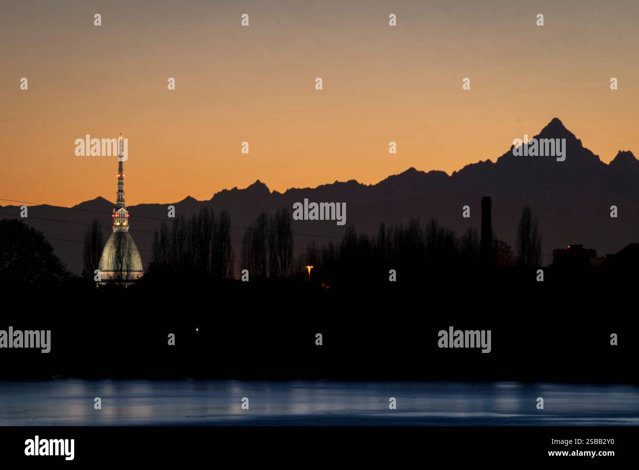 The Mole Antonelliana ant the Monviso in the Sunset in Turin Stock ...