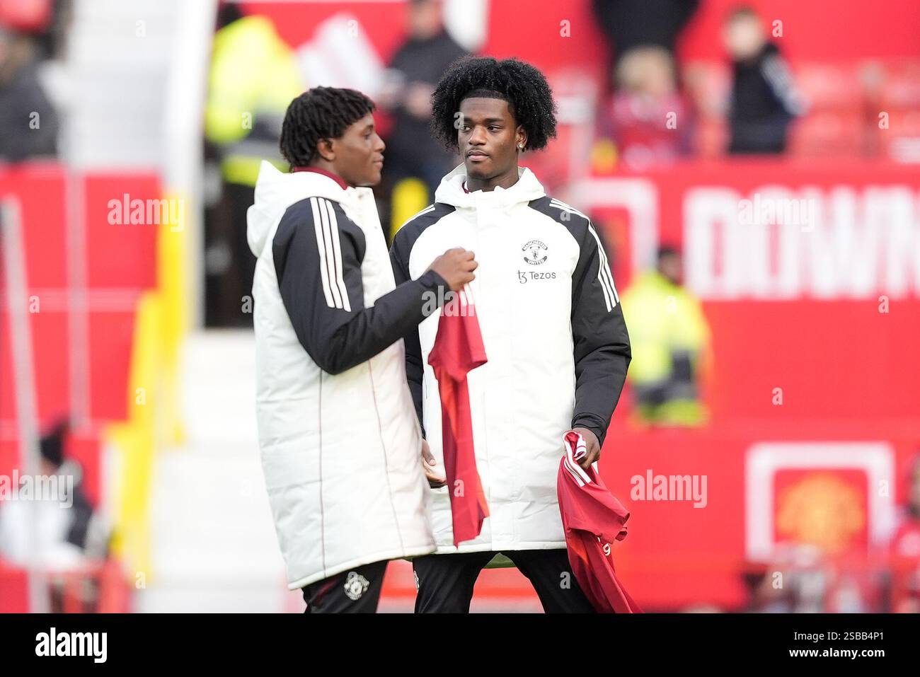 New Manchester United players Patrick Dorgu (left) and Ayden Heaven are ...