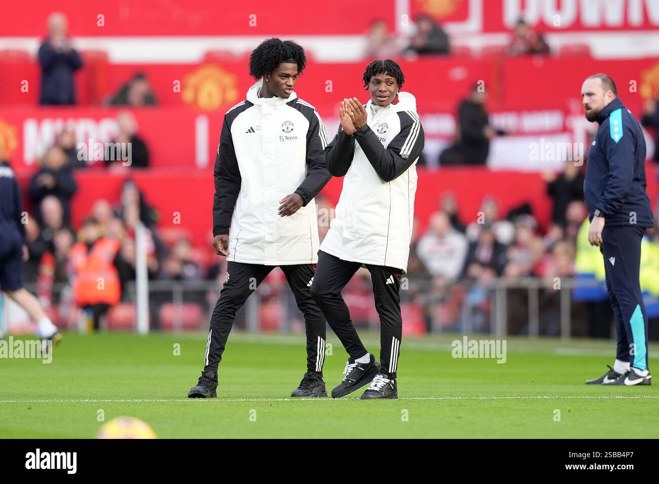 New Manchester United players Patrick Dorgu (right) and Ayden Heaven ...