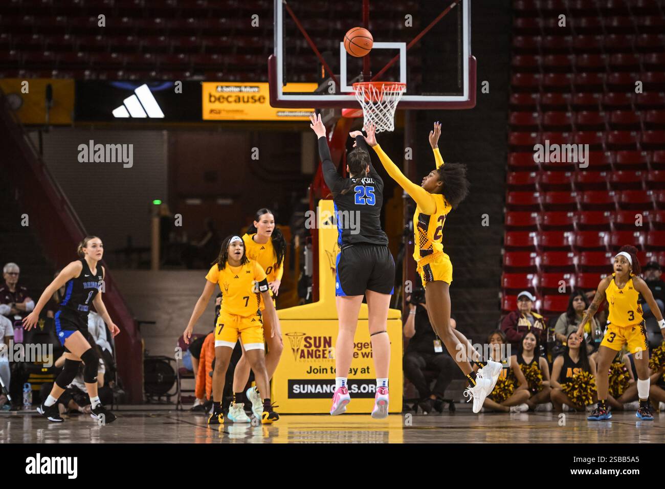 BYU Cougars forward Emma Calvert (25) shoots a three pointer in the ...