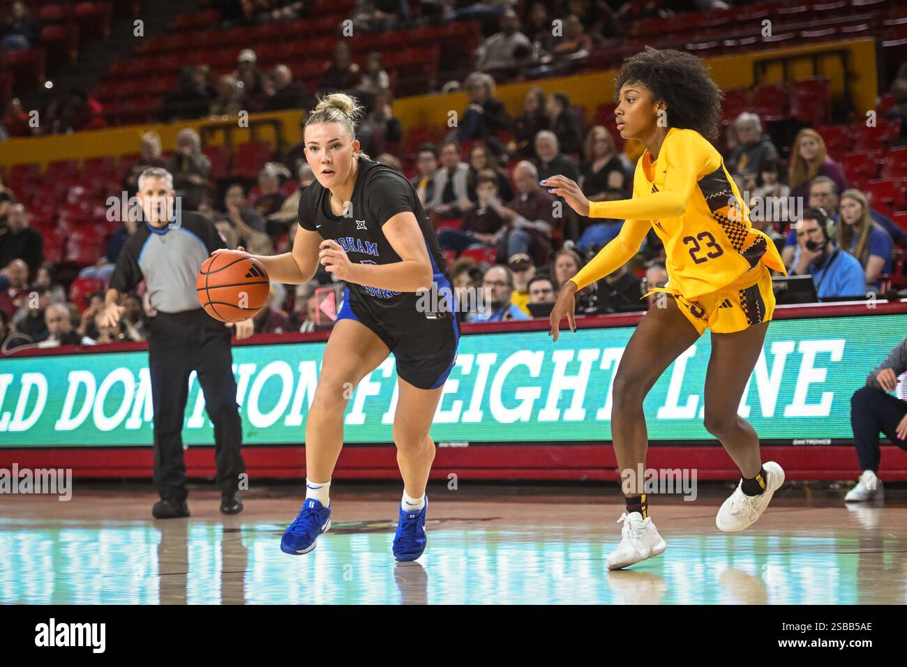 BYU Cougars guard Kambree Barber (14) drives toward the basket in the ...
