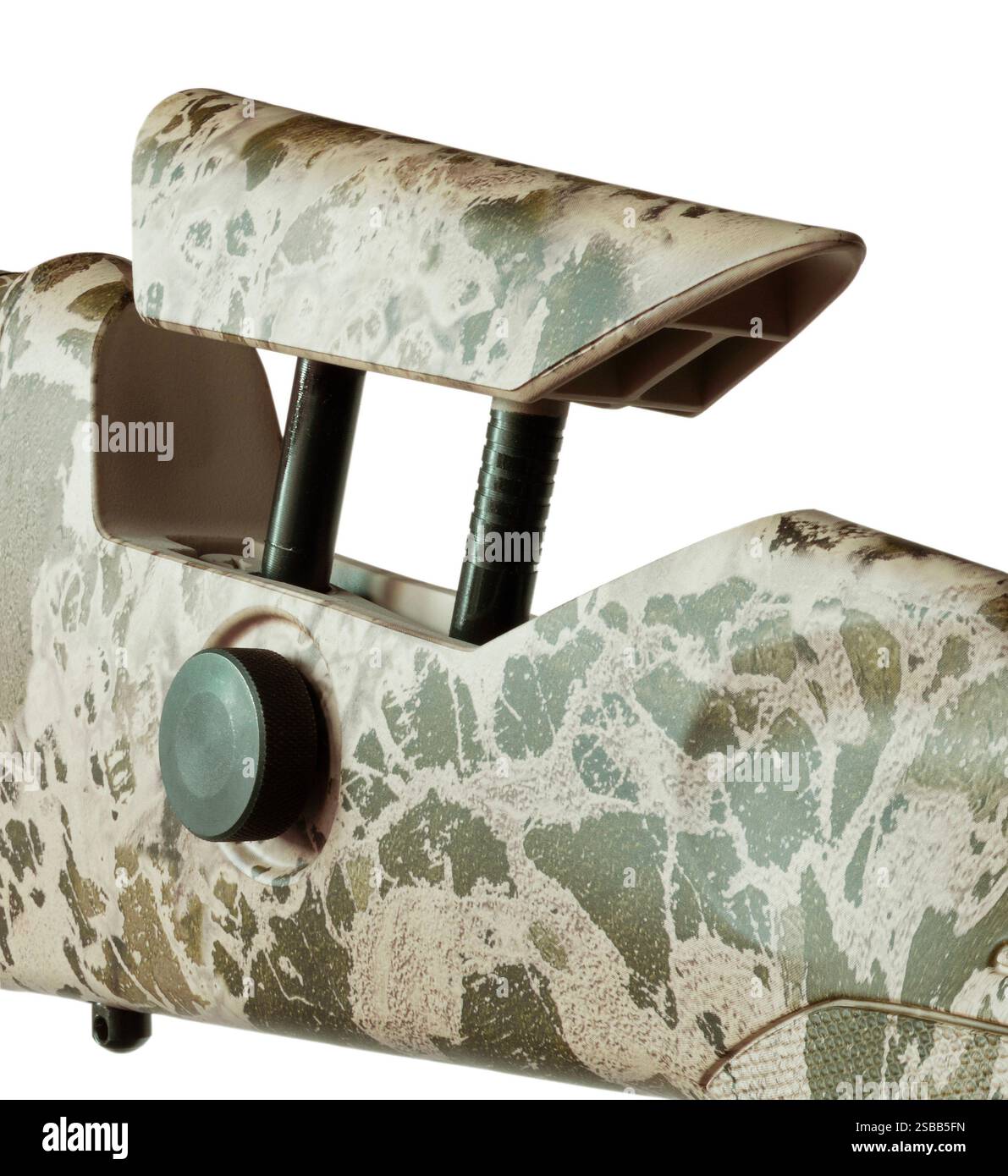 Cheekpiece on a camouflage right that has been adjusted to a high ...