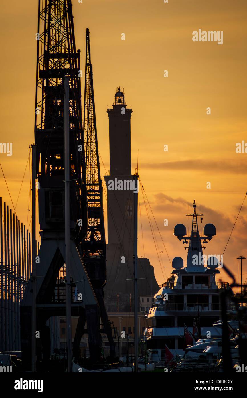 The old Porto Antico of Genoa at the sunset viewing the Lantern of ...