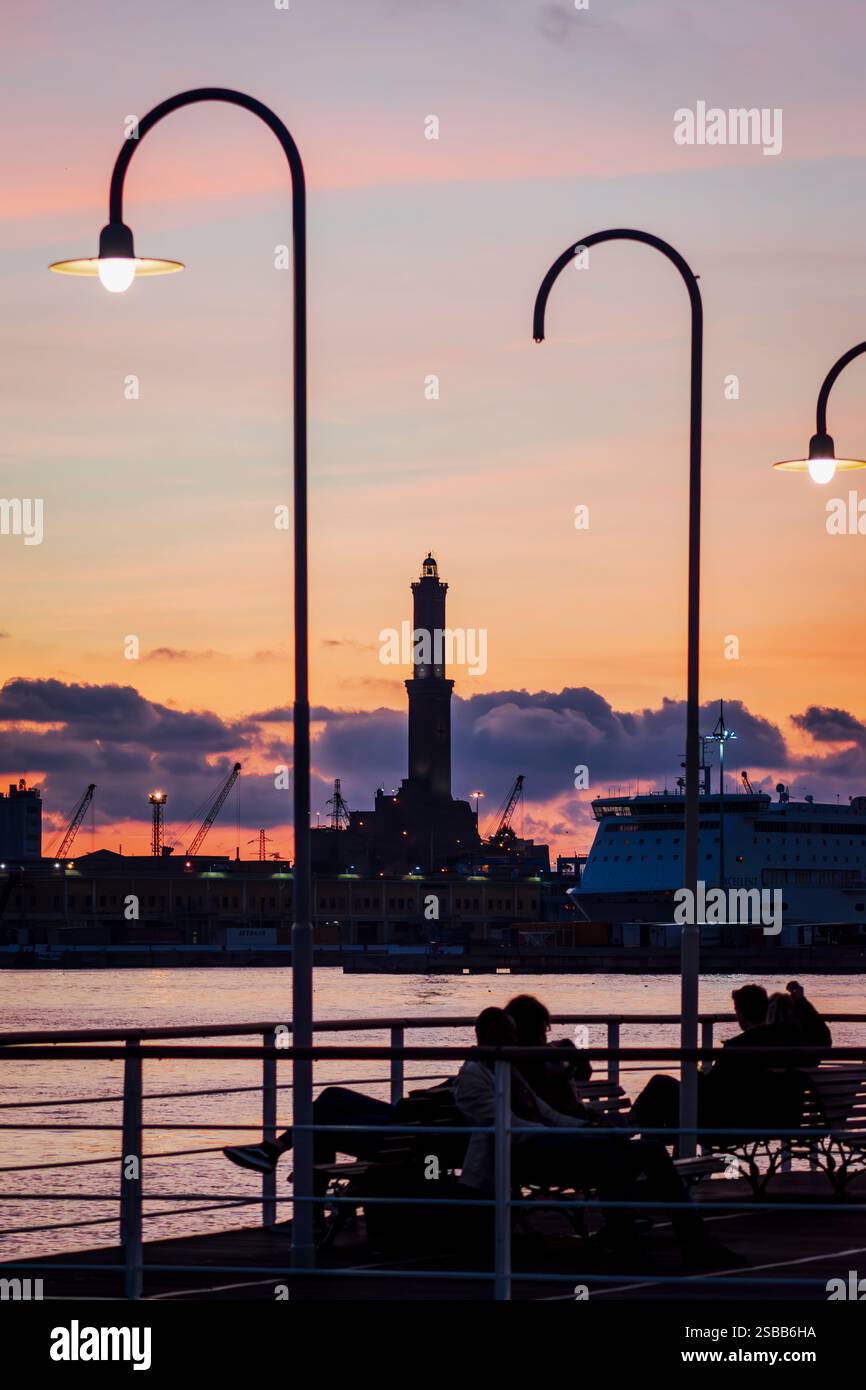 The old Porto Antico of Genoa at the sunset viewing the Lantern of ...
