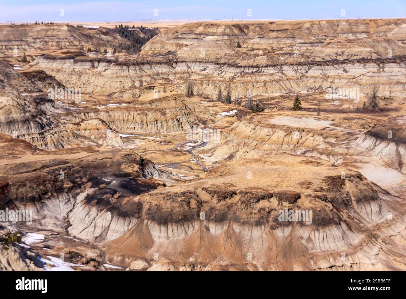 A desolate landscape with a river running through it. The river is ...