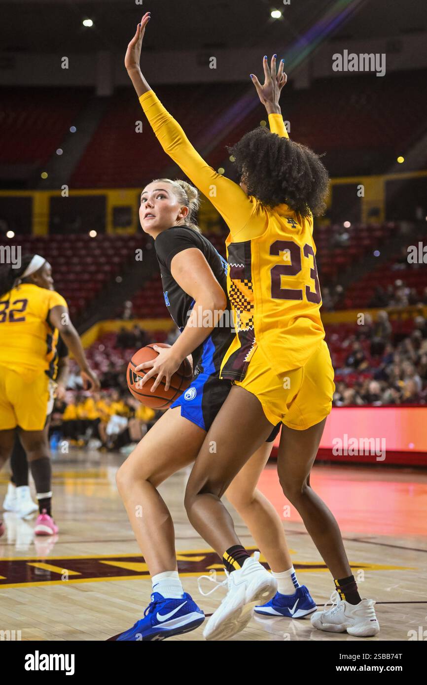 BYU Cougars guard Kambree Barber (14) drives toward the basket in the ...