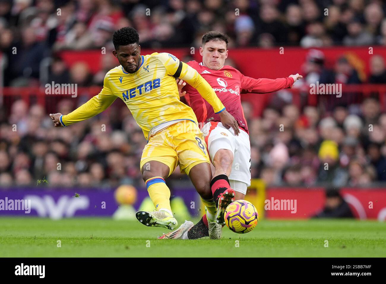 Crystal Palace's Jefferson Lerma (left) and Manchester United's Manuel Ugarte battle for the ...