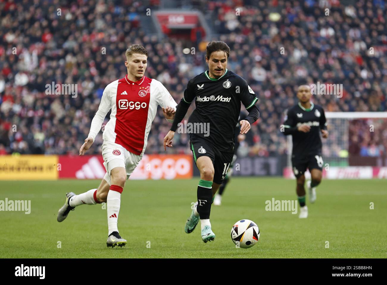 AMSTERDAM - (l-r) Anton Gaaei of Ajax, Hugo Bueno of Feyenoord during ...