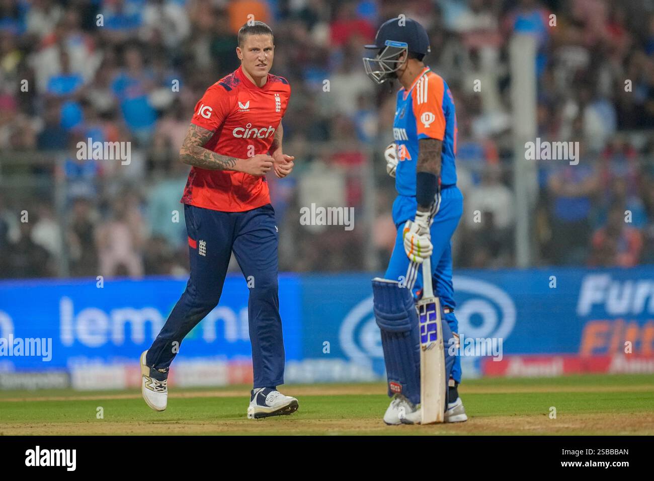 England's Brydon Carse, left, celebrates the wicket of India's captain ...