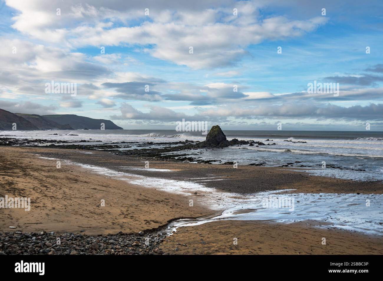 Winter sunny dawn on Widemouth Bay beach Cornwall South West England ...