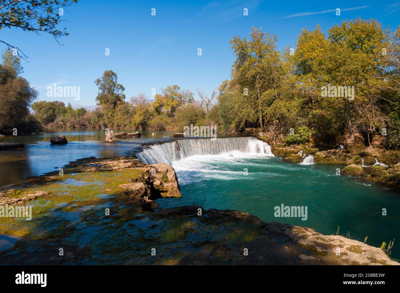 Beautiful wide angle view of the Manavgat waterfall. Tourism symbols of ...