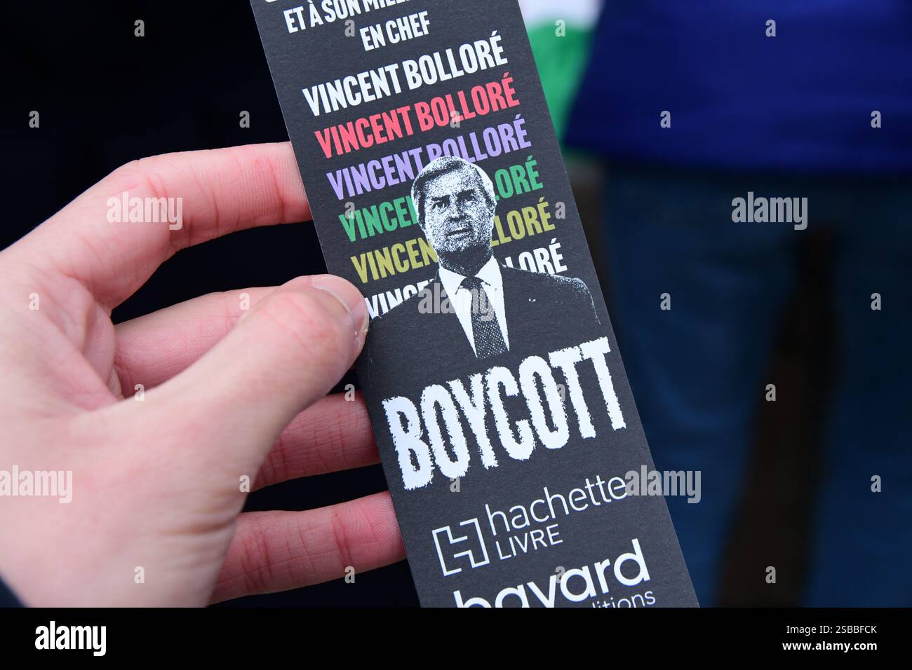 A protester holds a poster during the demonstration against businessman ...