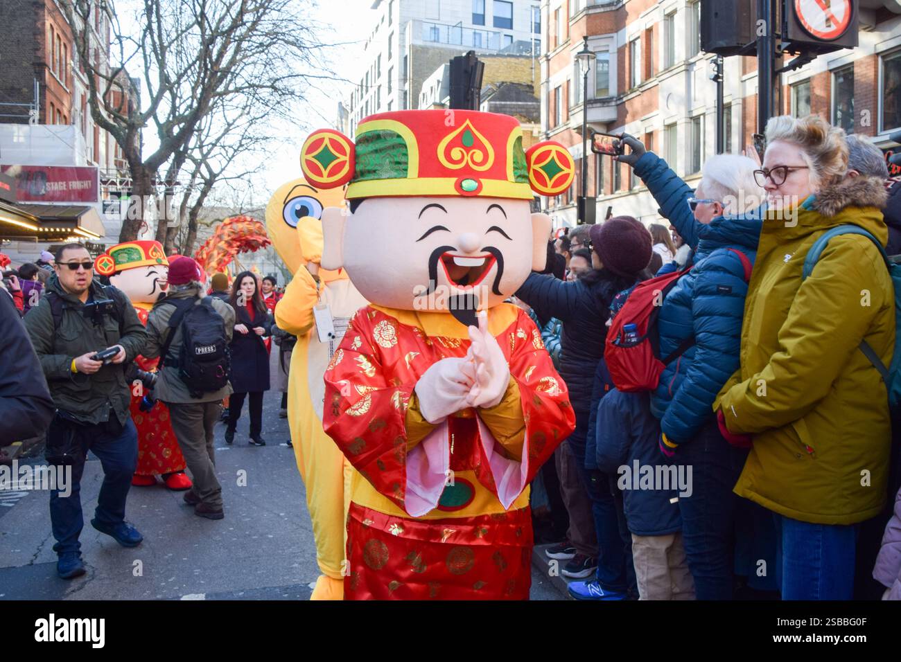 A performer in a costume entertains the crowds during the Chinese New ...