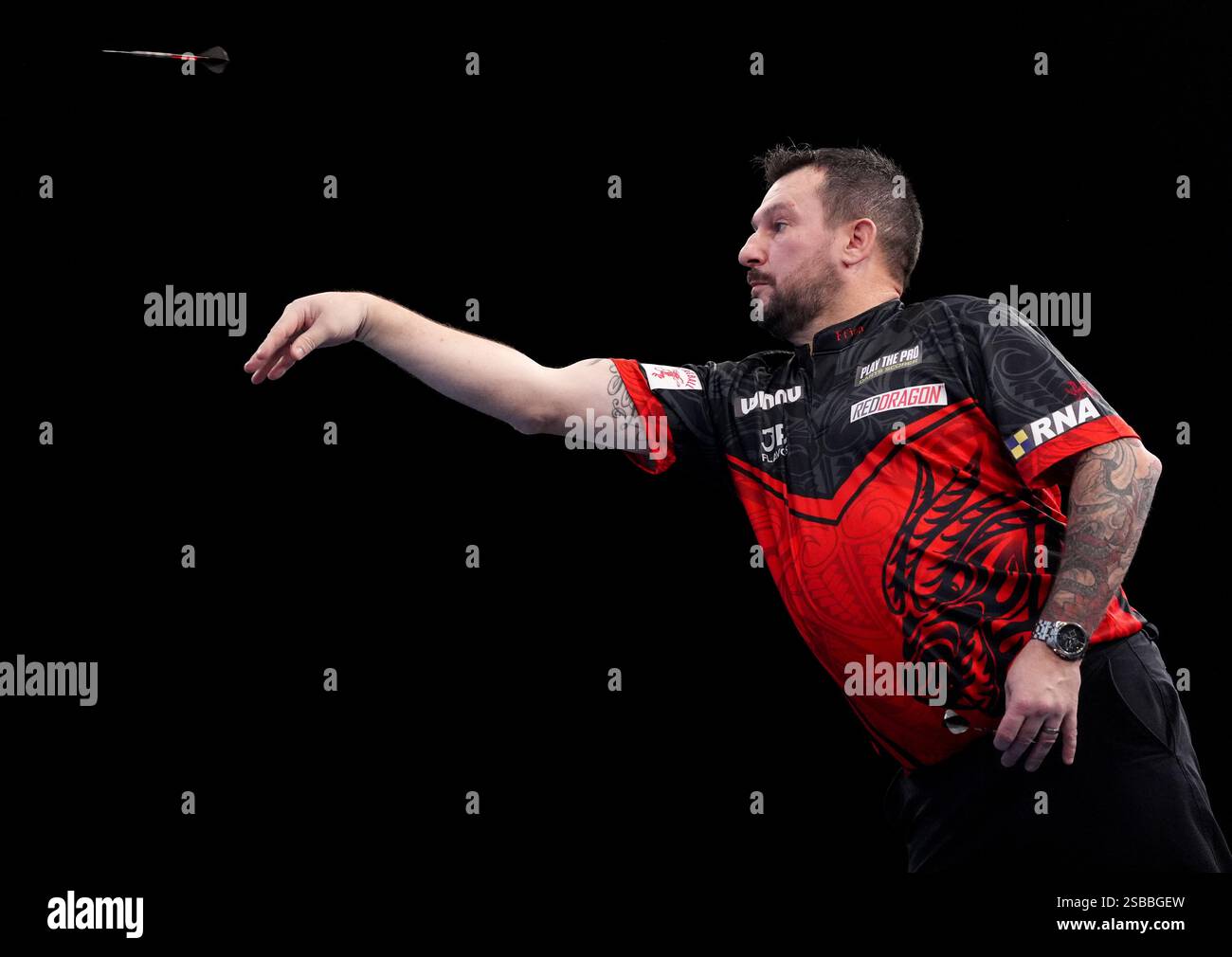 Jonny Clayton during his quarter final match against Luke Littler on ...