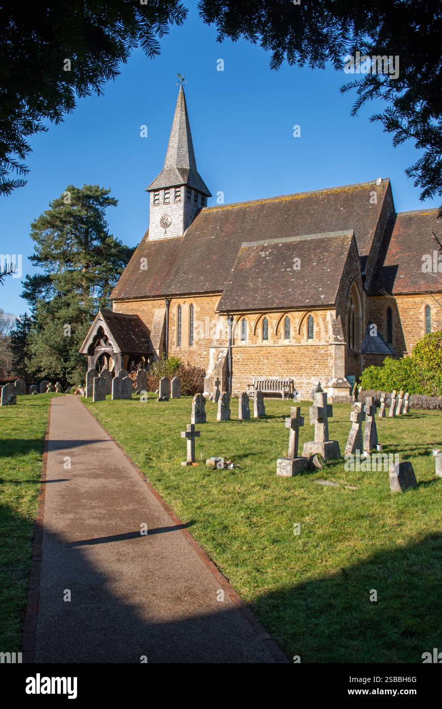 St Peter's Church in Hascombe village in the Surrey Hills AONB, England, UK, exterior view of ...