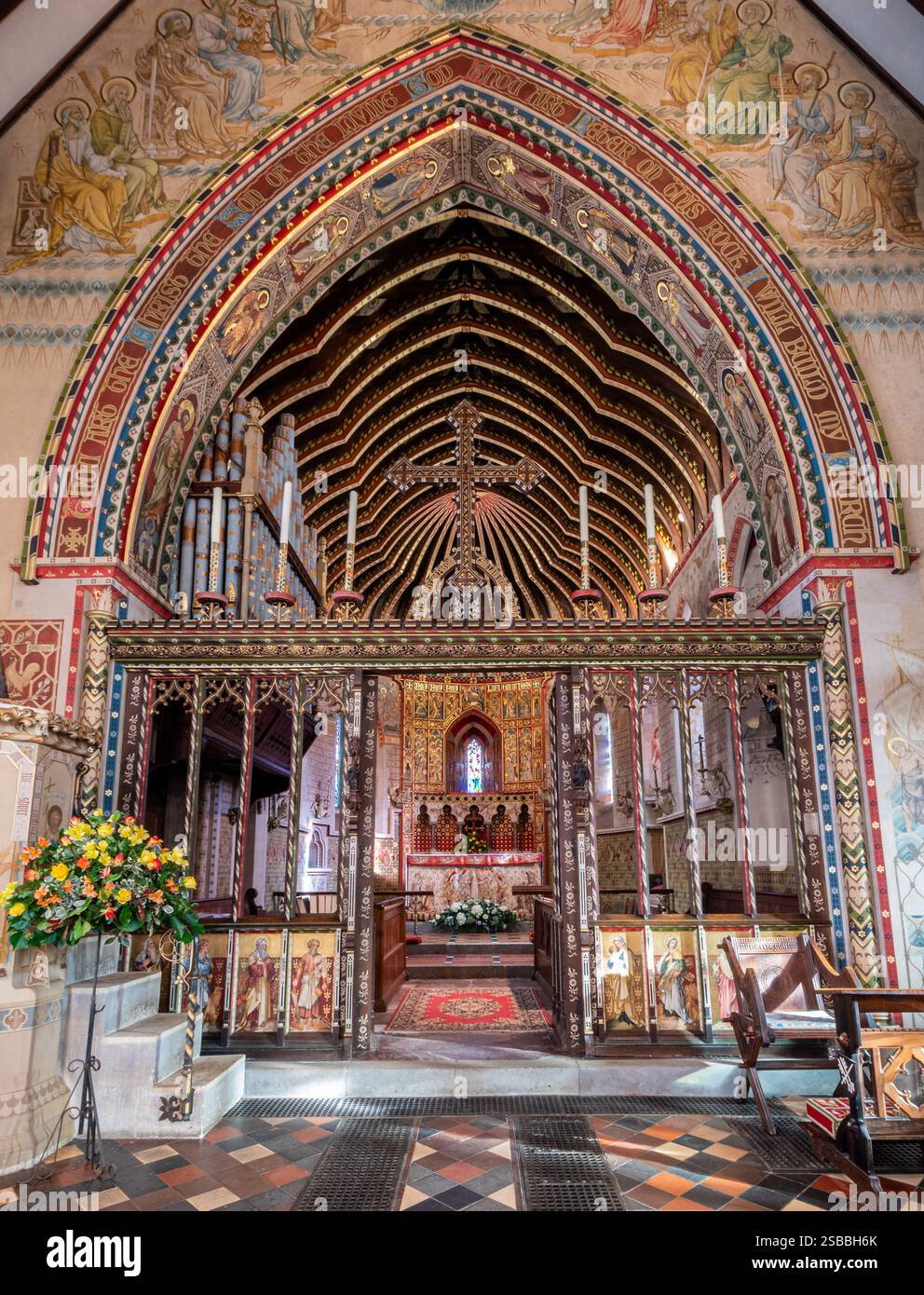 St Peter's Church in Hascombe village in the Surrey Hills, England, UK. Interior view with the ...