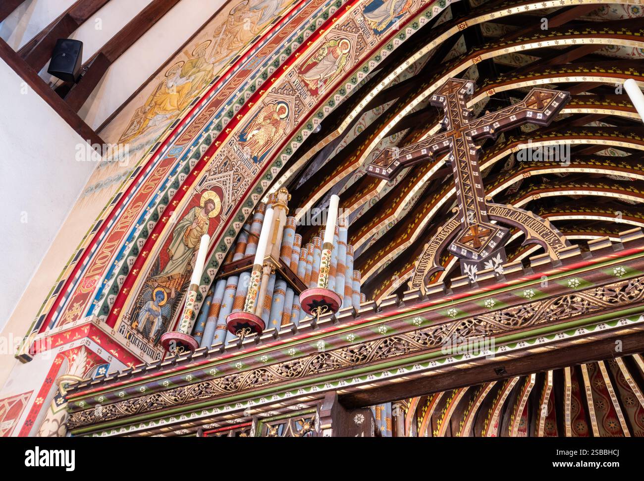 St Peter's Church in Hascombe village in the Surrey Hills AONB, England, UK. Interior view with ...