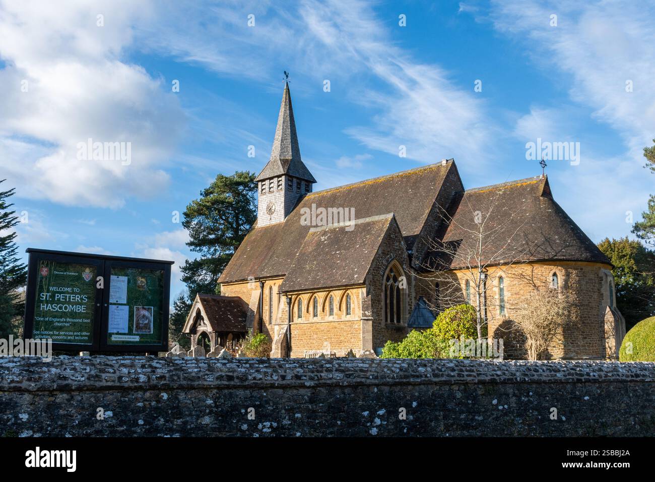 St Peter's Church in Hascombe village in the Surrey Hills AONB, England, UK, exterior view of ...