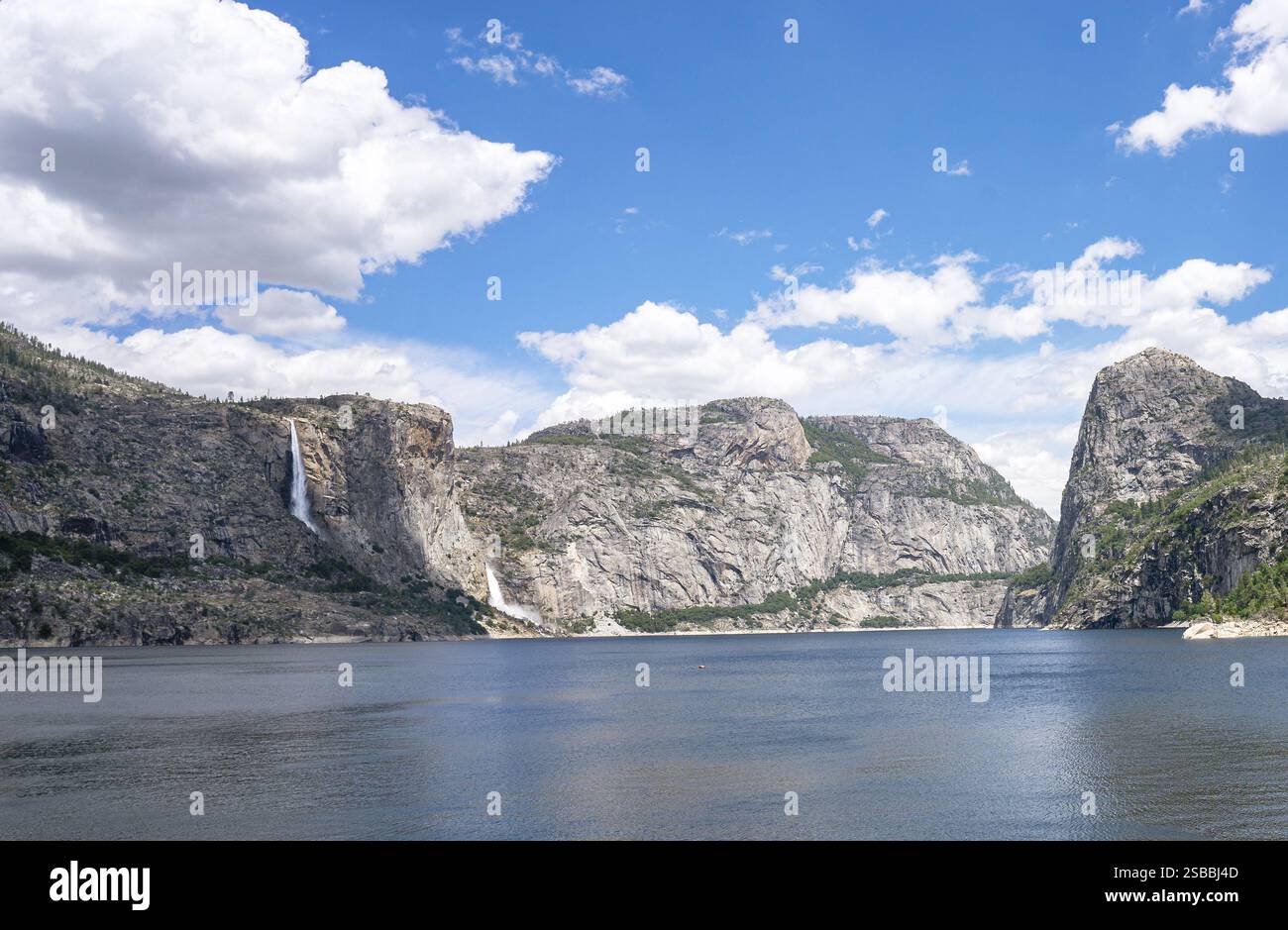 Hetch Hetchy Reservoir with views of Tueeulala and Wapama Falls. The ...
