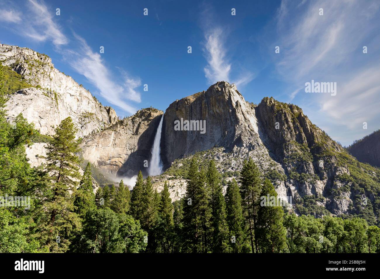Yosemite National Park, granite rocks and a pine forest frame the Upper ...