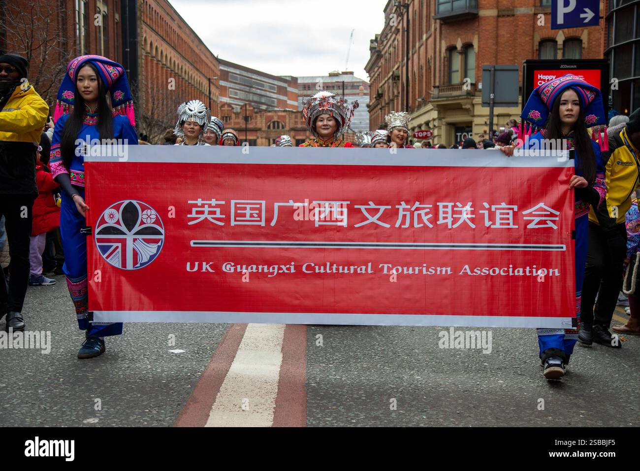 Manchesters Chinese New Year, Dragon Parade with people handing out ...