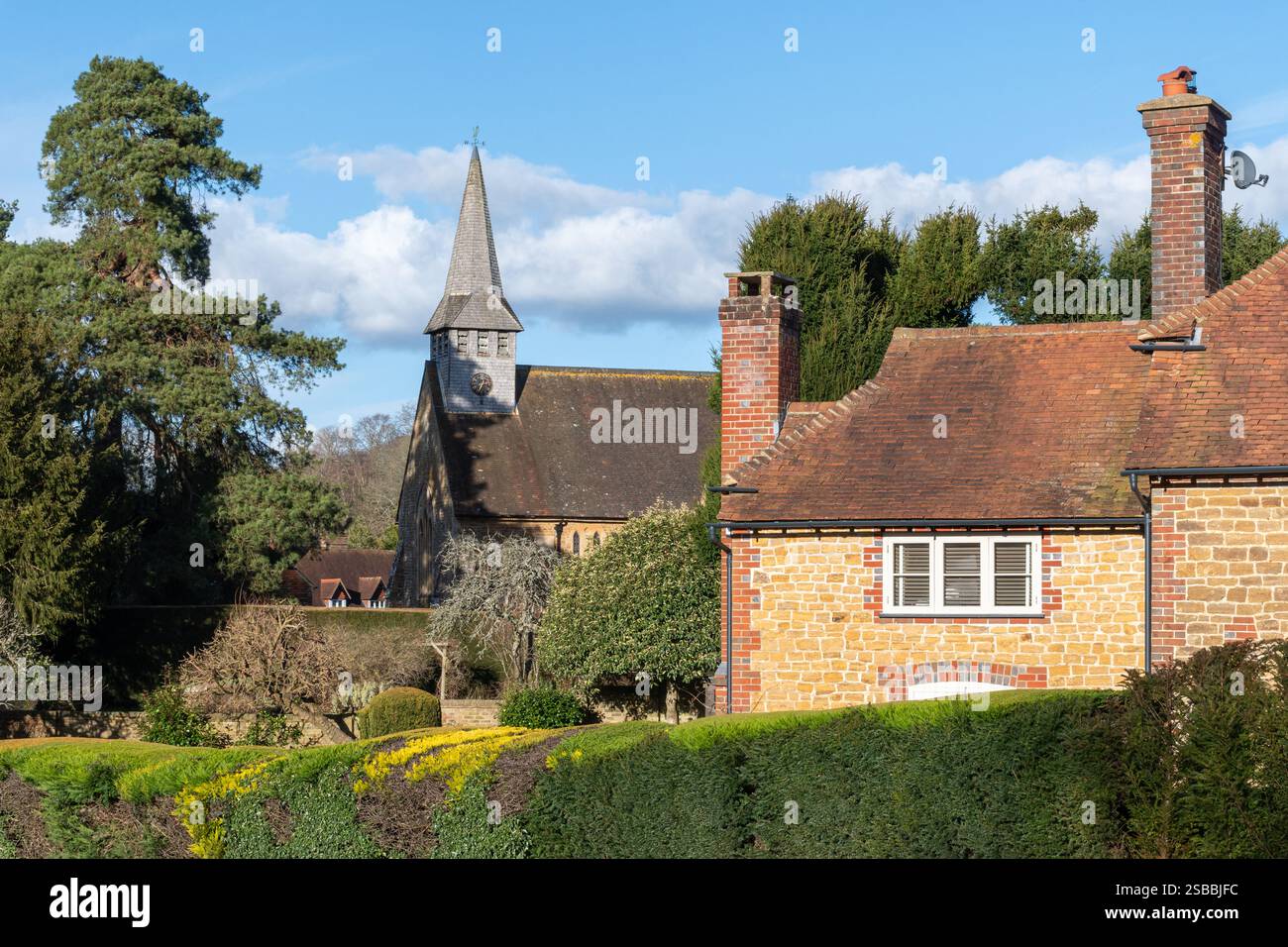 The pretty village of Hascombe in the Surrey Hills National Landscape (AONB) with St Peter's ...