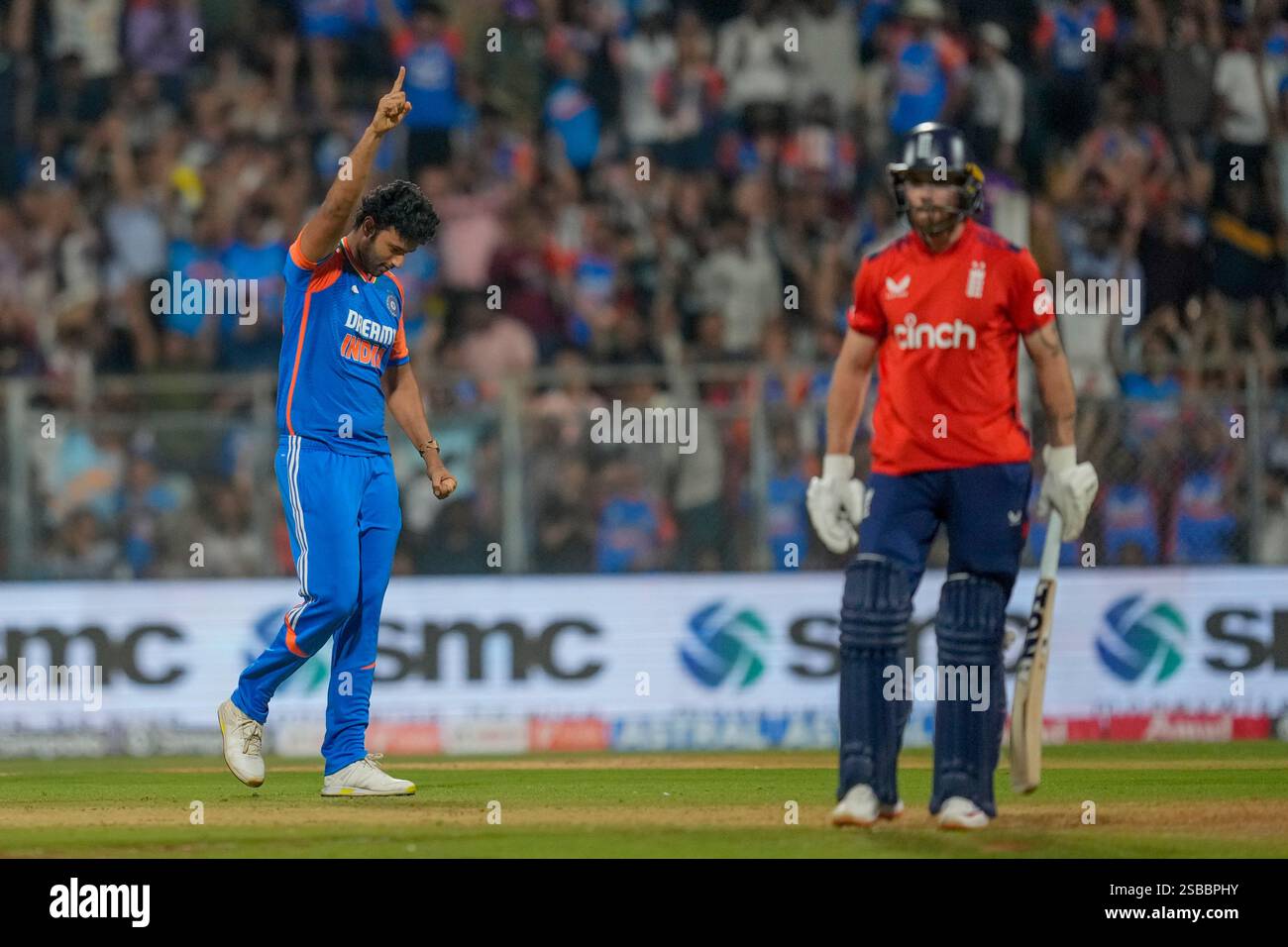 India's Shiva Dube, left, celebrates the wicket of England's Phil Salt ...