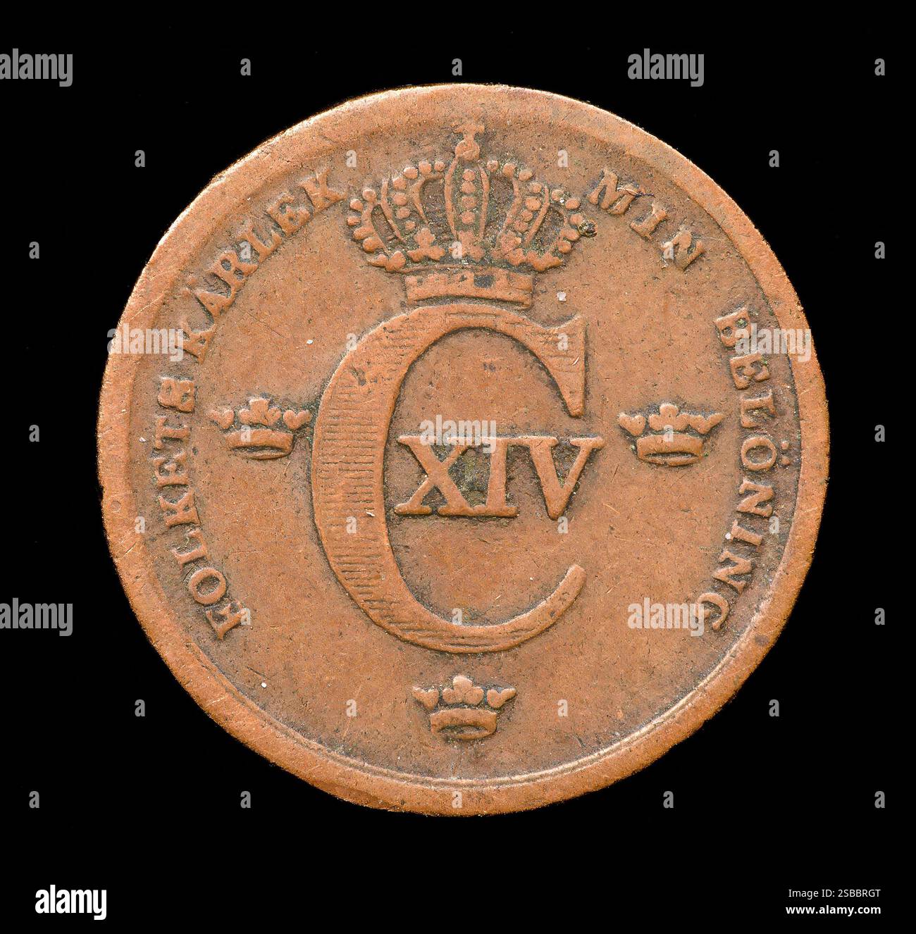 This antique copper coin features a prominent crowned monogram with the ...