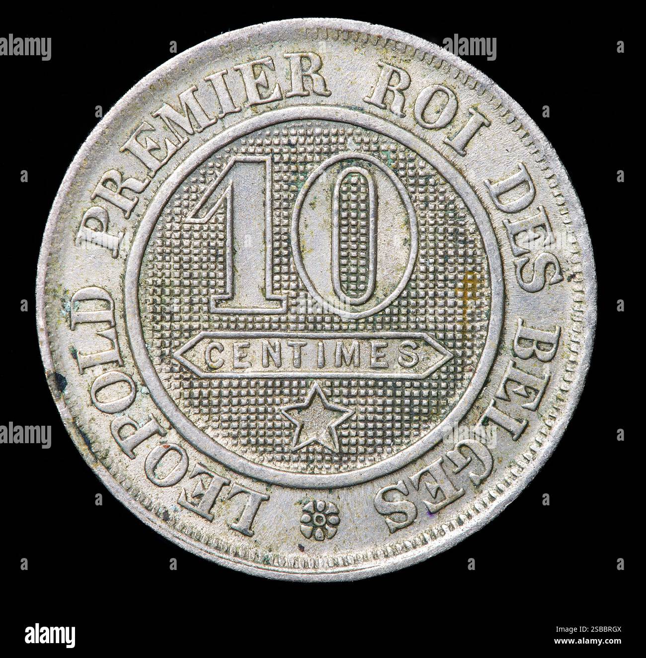 Coin features the denomination of 10 centimes and represents a piece of ...