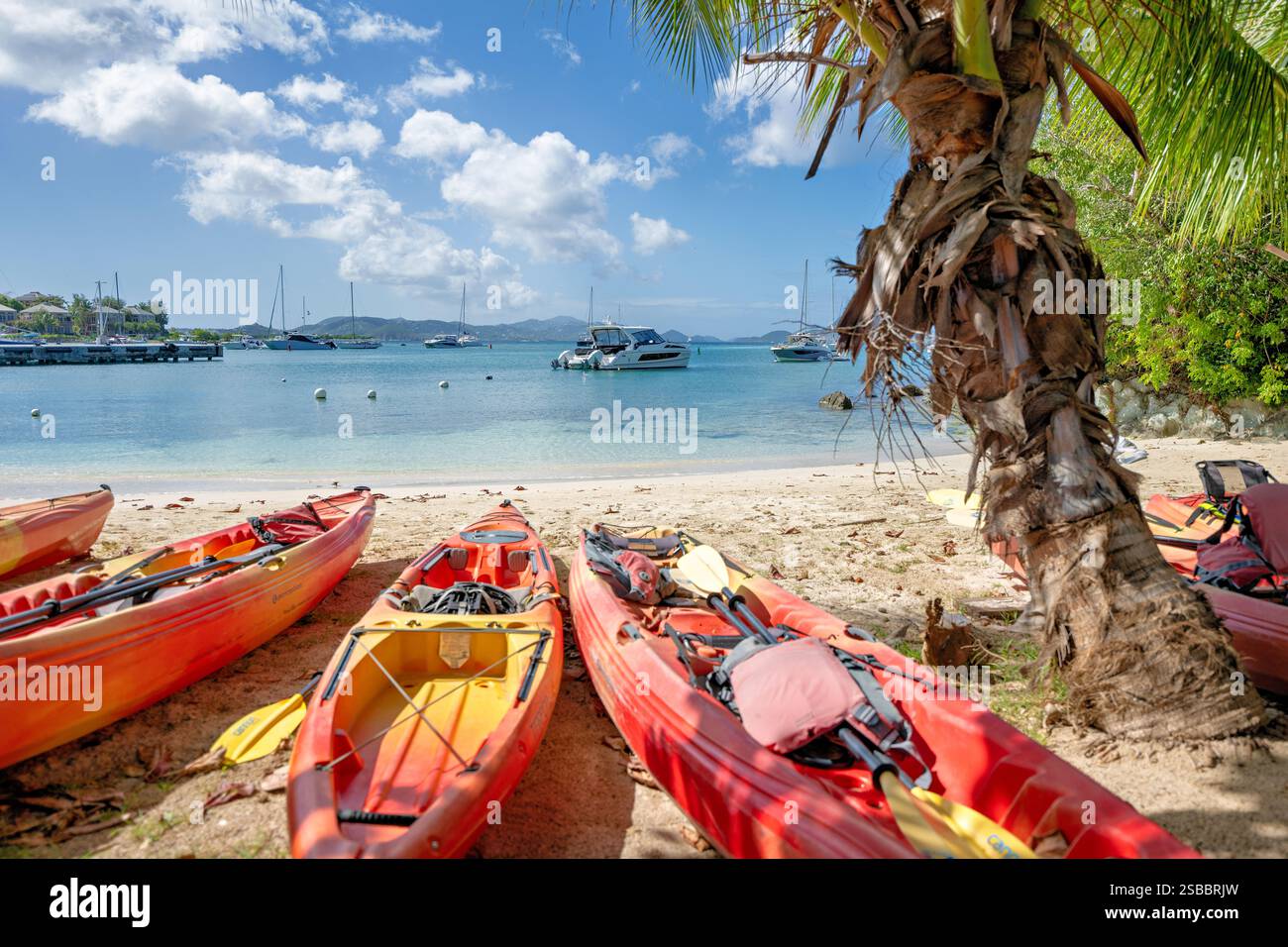 CRUZ BAY, US Virgin Islands — Kayaks sit on the beach at Cruz Bay ...