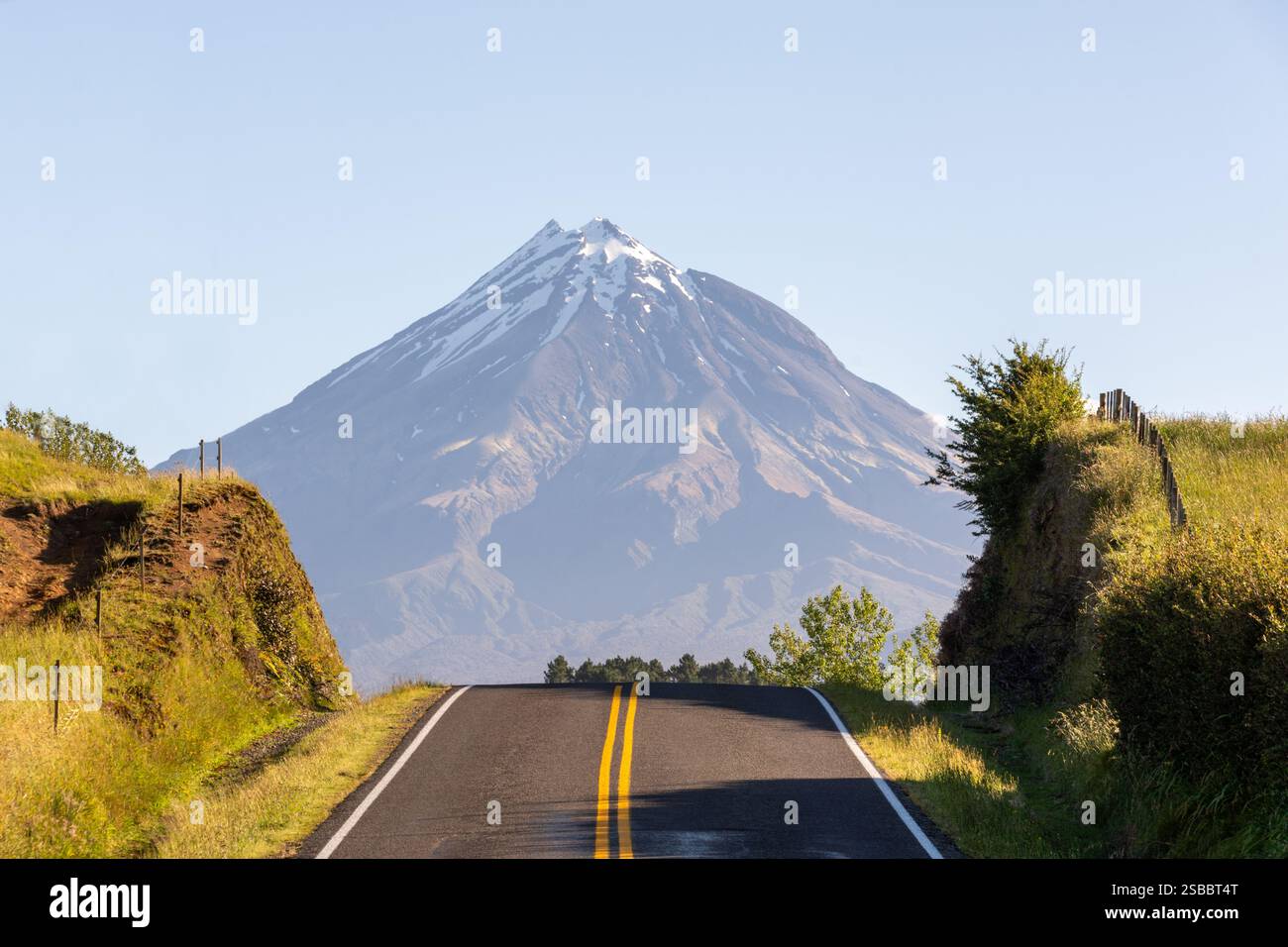 Kent road and peak of Mount Taranaki in the background, New Zealand ...