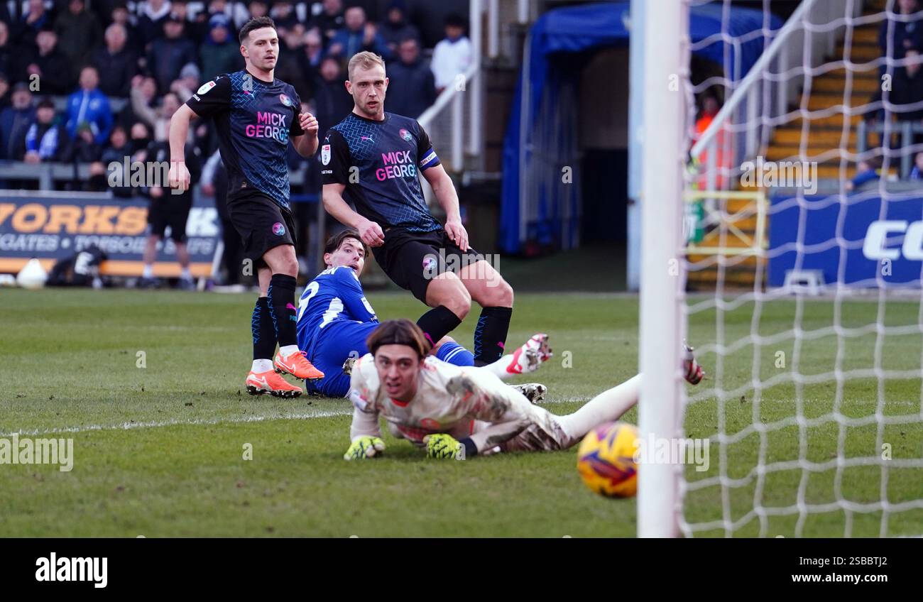 Bristol Rovers Isaac Hutchinson (centre) scores their second goal ...
