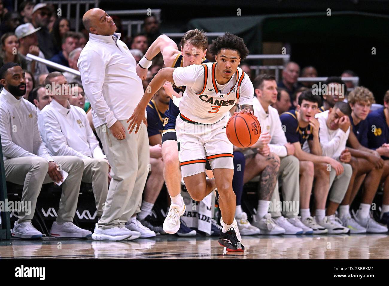 CORAL GABLES, FL - FEBRUARY 01: Miami guard Jalil Bethea (3), followed ...