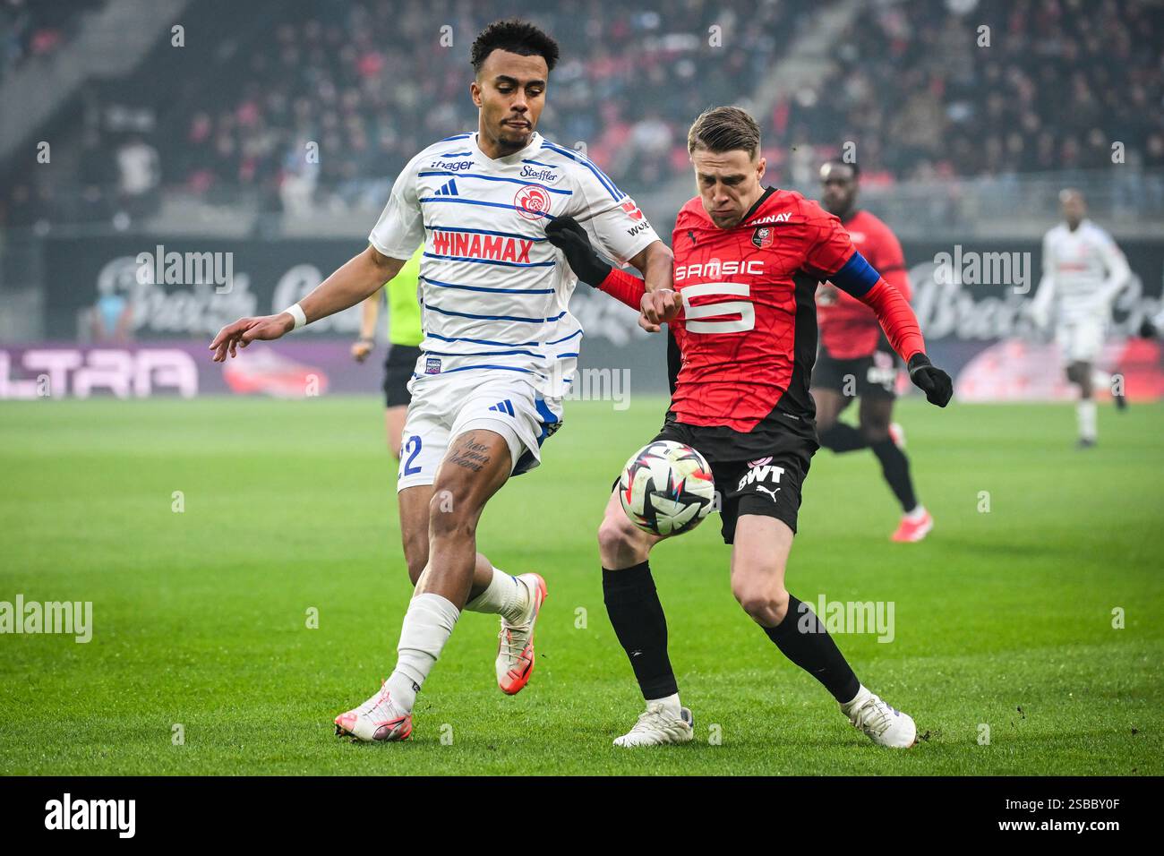 Guela DOUE of Strasbourg and Adrien TRUFFERT of Rennes during the ...