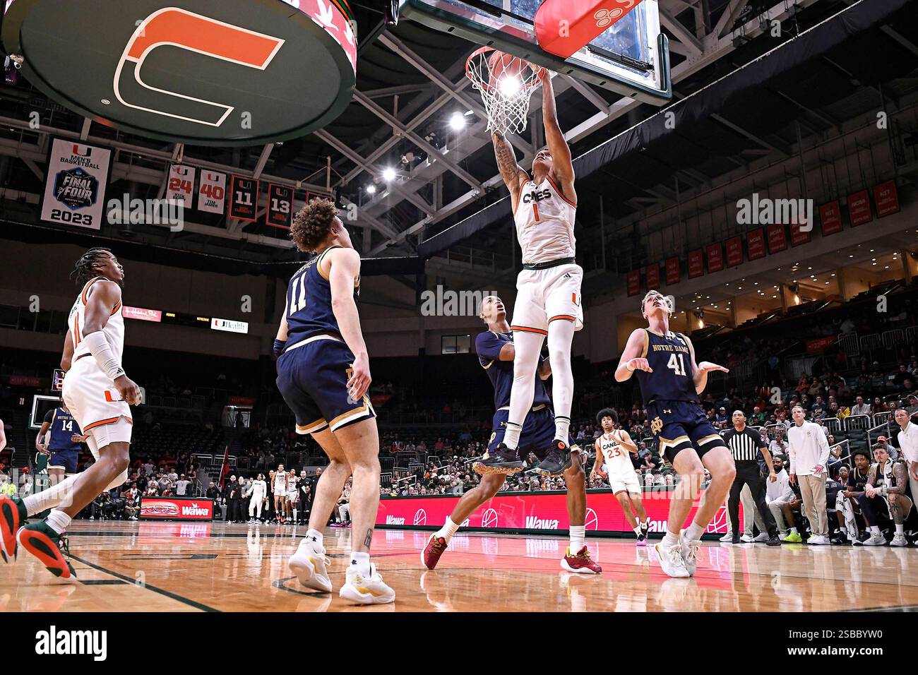 CORAL GABLES, FL - FEBRUARY 01: Miami center Lynn Kidd (1) dunks the ...