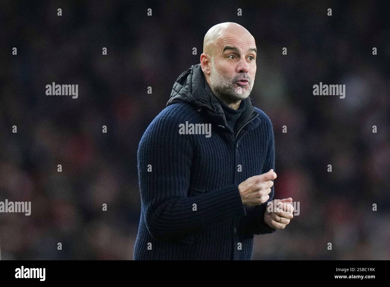 Manchester City's head coach Pep Guardiola gestures during the English ...